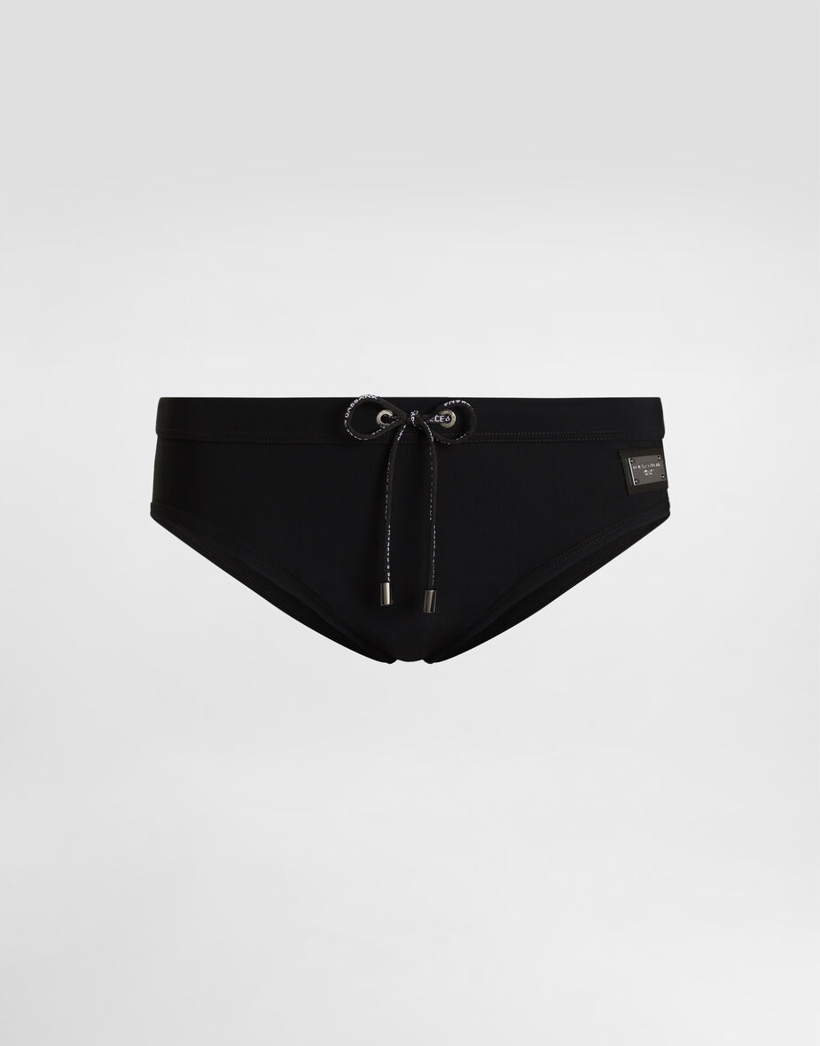 Swim briefs with high-cut leg and branded tag in Black for Men | Dolce ...