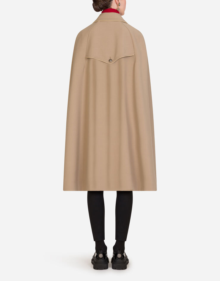 Woolen cape with decorative buttons