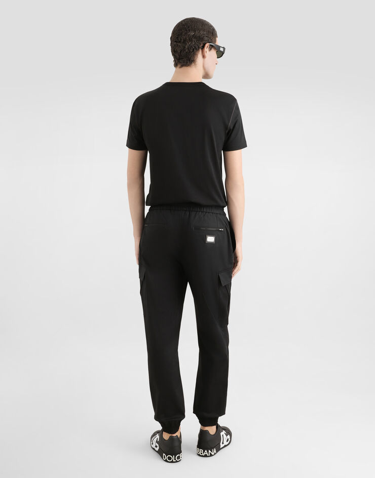 Cotton cargo pants with branded tag in Black for Men | Dolce&Gabbana®