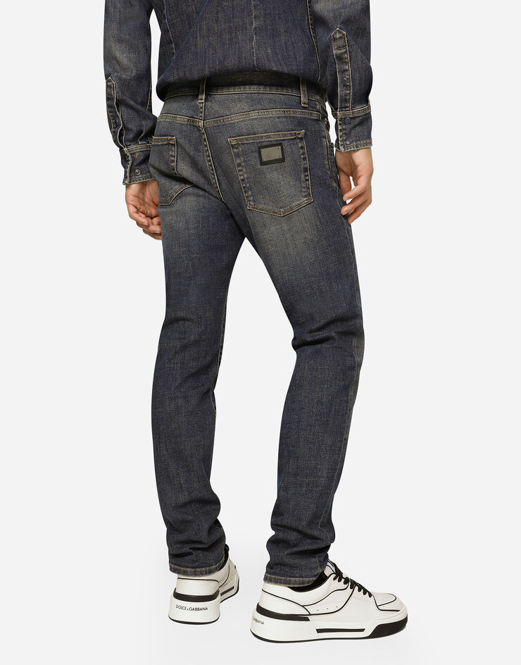 Light blue wash slim-fit stretch jeans in Multicolor for Men | Dolce ...
