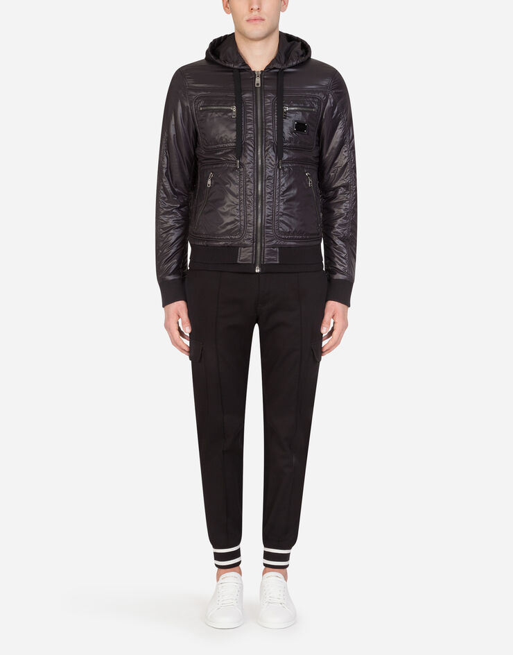 Nylon quilted jacket with hood and patch
